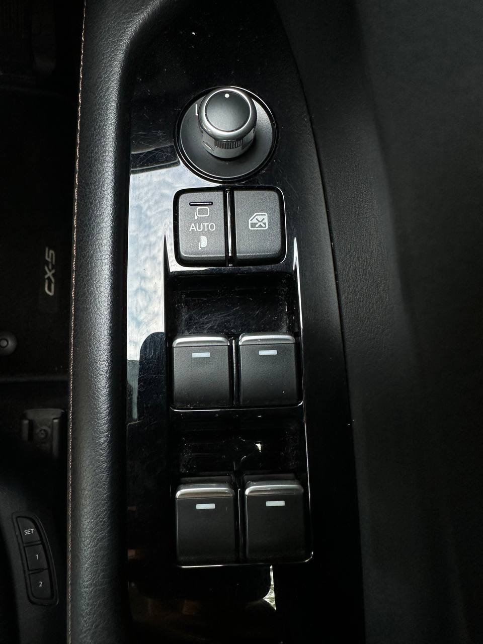 How do I adjust the side mirrors in the Mazda CX-5? – GetGo Help Centre